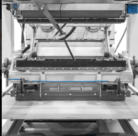 How do the concrete block machines work?